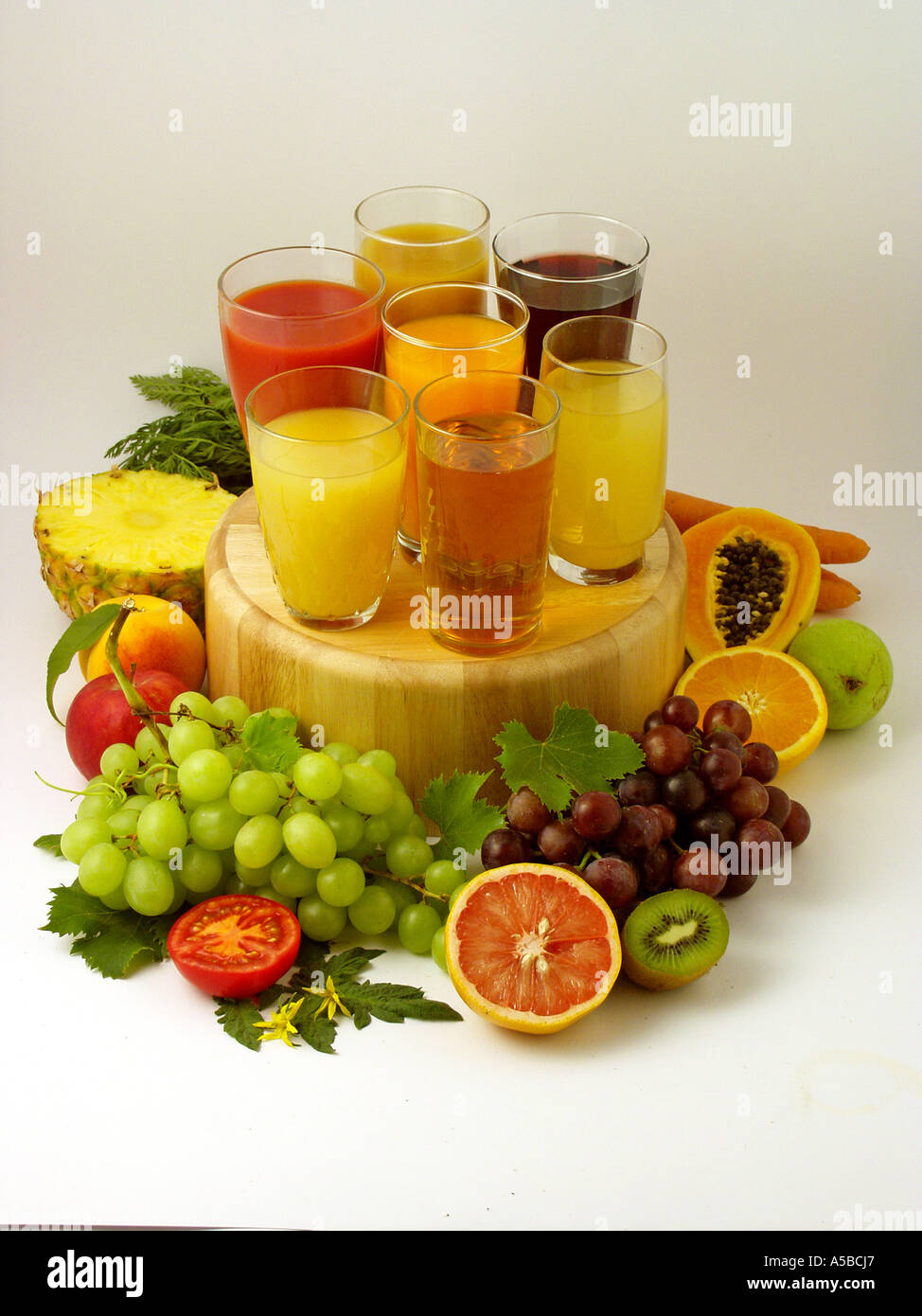 Assorted fruits and juice Stock Photo - Alamy