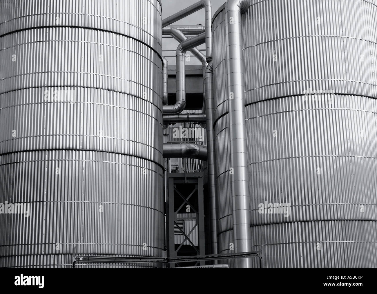 Large industrial metal storage tanks Stock Photo - Alamy