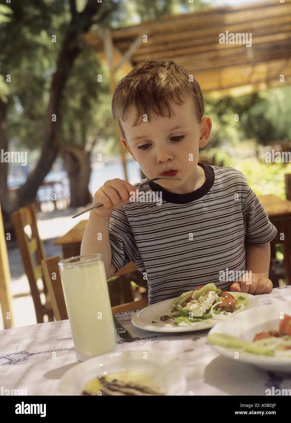 Kid try new food hi-res stock photography and images - Alamy