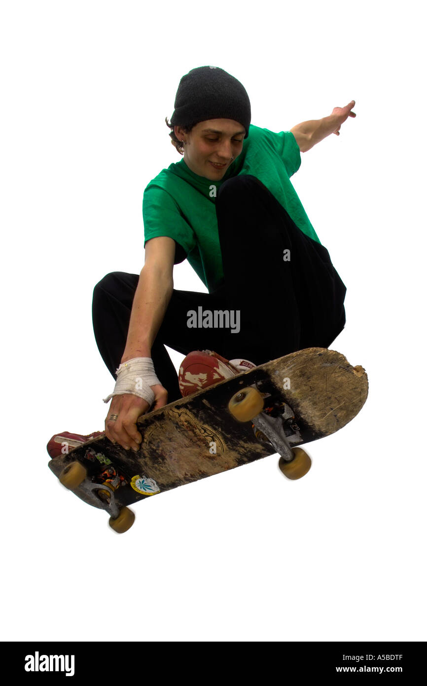 Skateboarder flying thought the air Stock Photo - Alamy