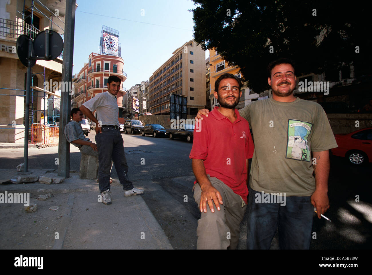 Men posing on a street in Beirut Stock Photo - Alamy