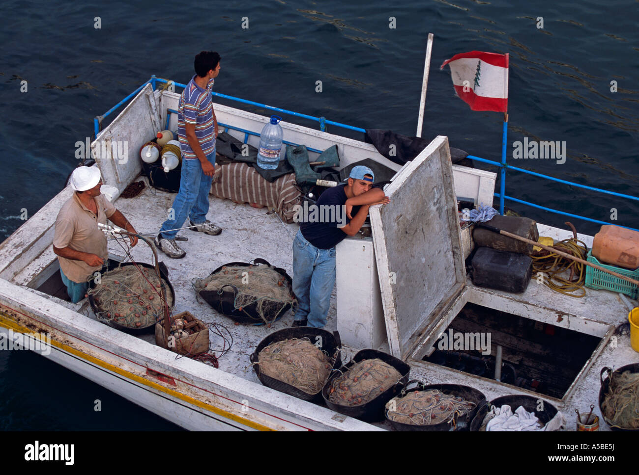 Fishermen on boat, Byblos, Lebanon Stock Photo - Alamy