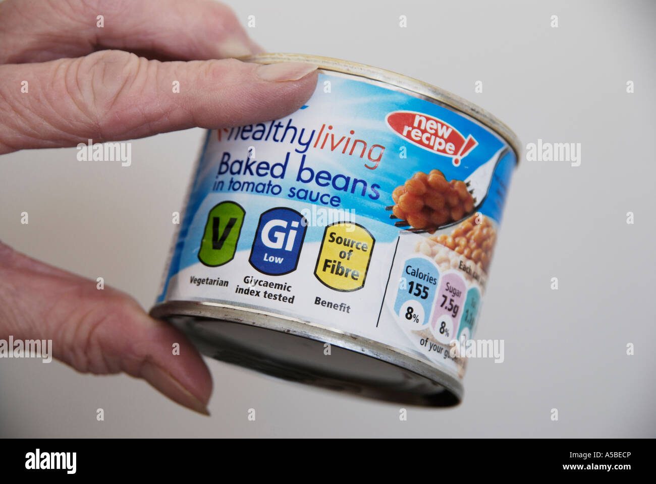 looking at nutritional information values content on a tin of baked ...