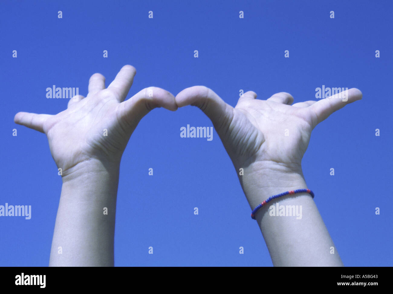Extending hands arms hi-res stock photography and images - Alamy