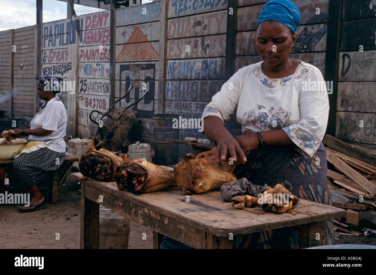 A woman selling meat South Africa Stock Photo - Alamy