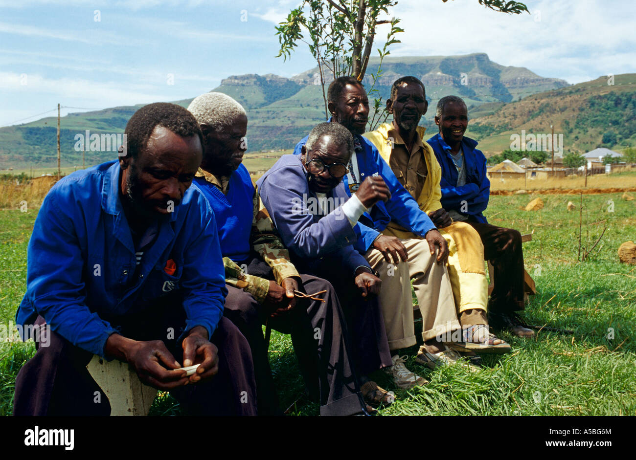 Senior men sitting together rural landscape, South Africa Stock Photo ...