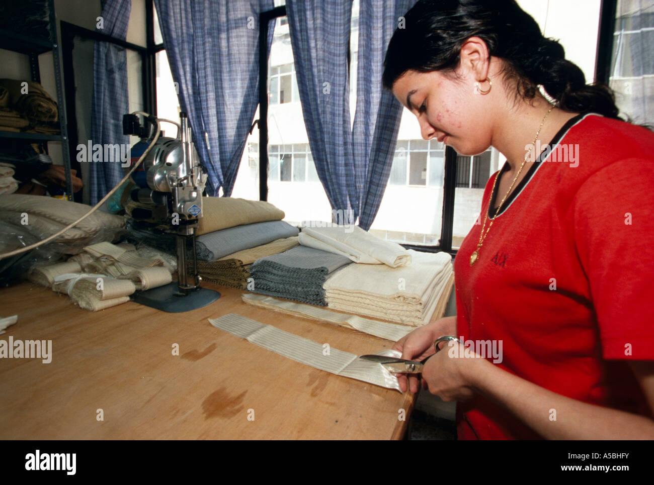 A woman working at a fabric factory Lebanon Stock Photo - Alamy