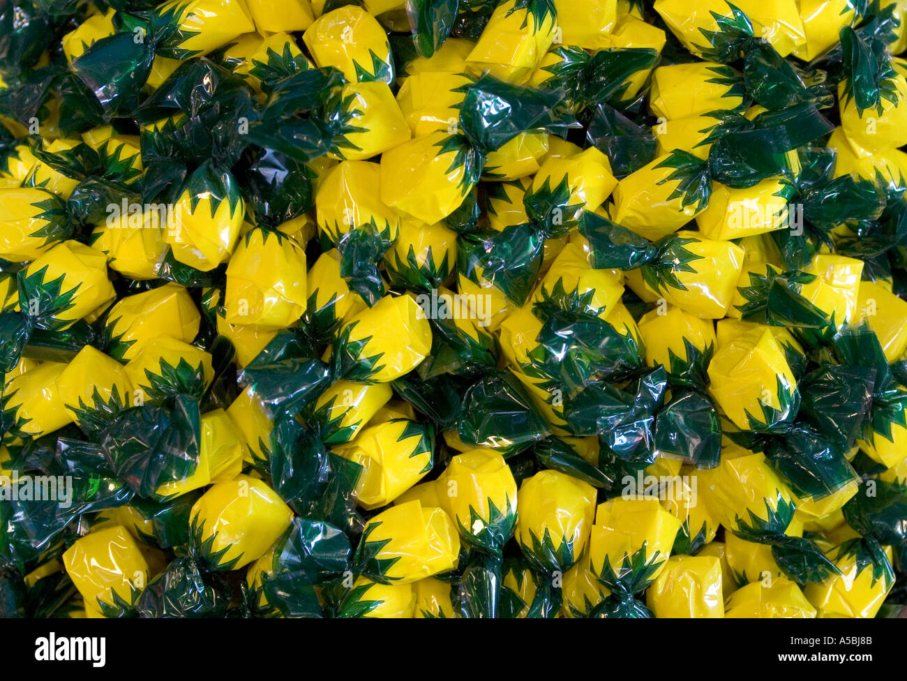 Yellow candy wrap hi-res stock photography and images - Alamy