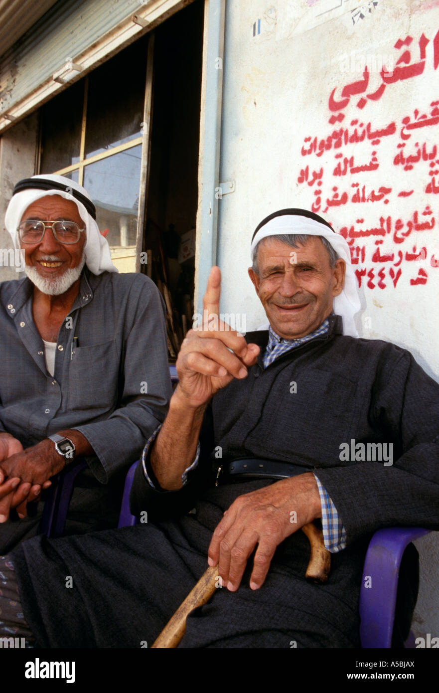 People sitting outside their houses in Aleppo Syria Stock Photo - Alamy