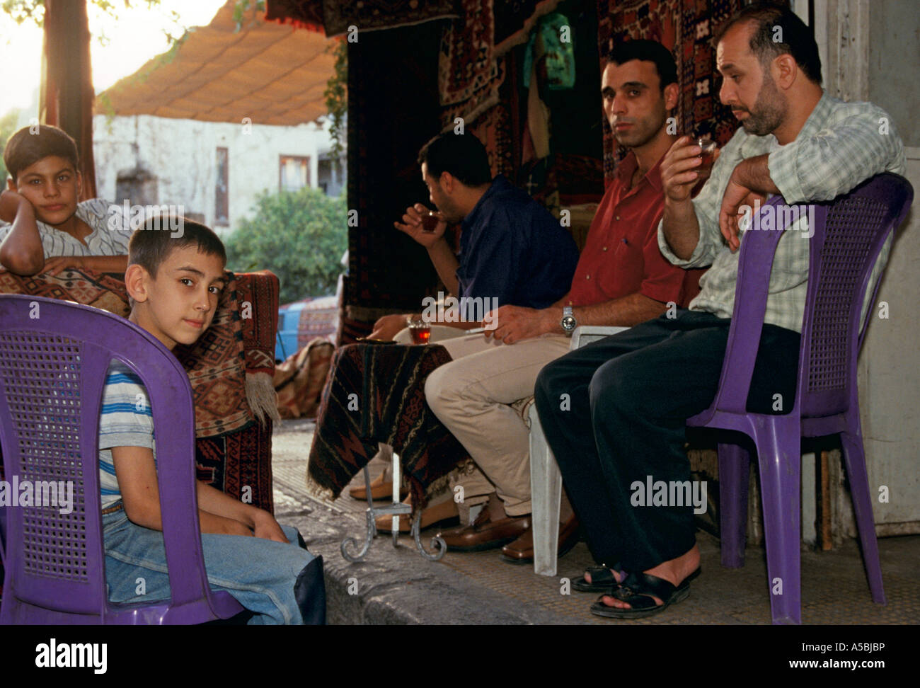 People enjoying coffee in Syria Stock Photo - Alamy