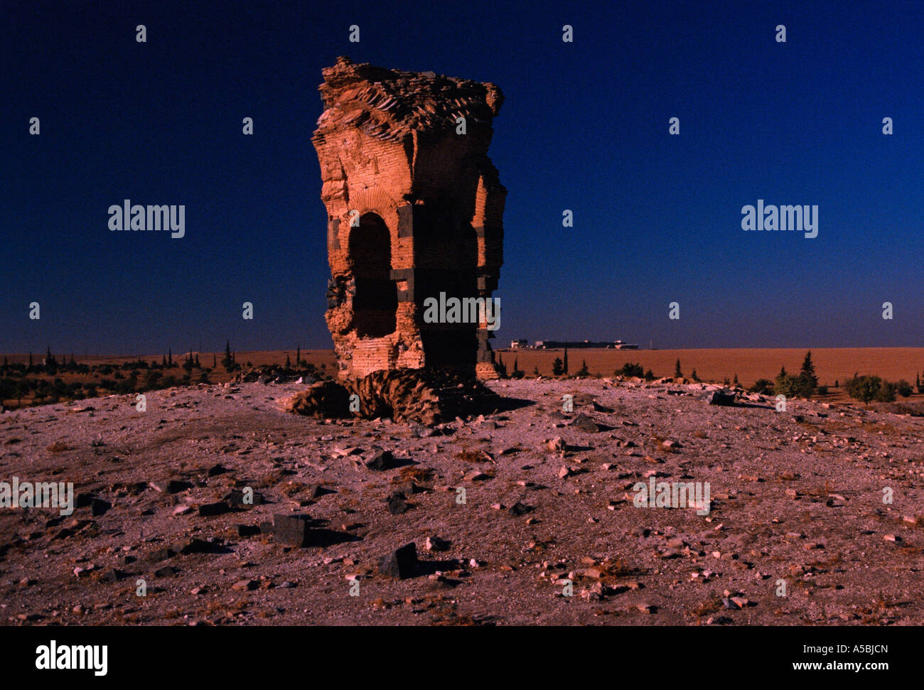 Ruin remains of stone tower in Syrian desert at dusk, Middle East Stock ...