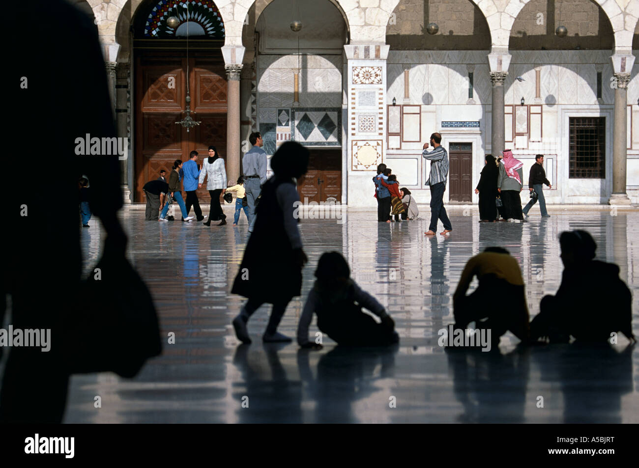 Children playing on the floor of the Umayyad Mosque Stock Photo - Alamy
