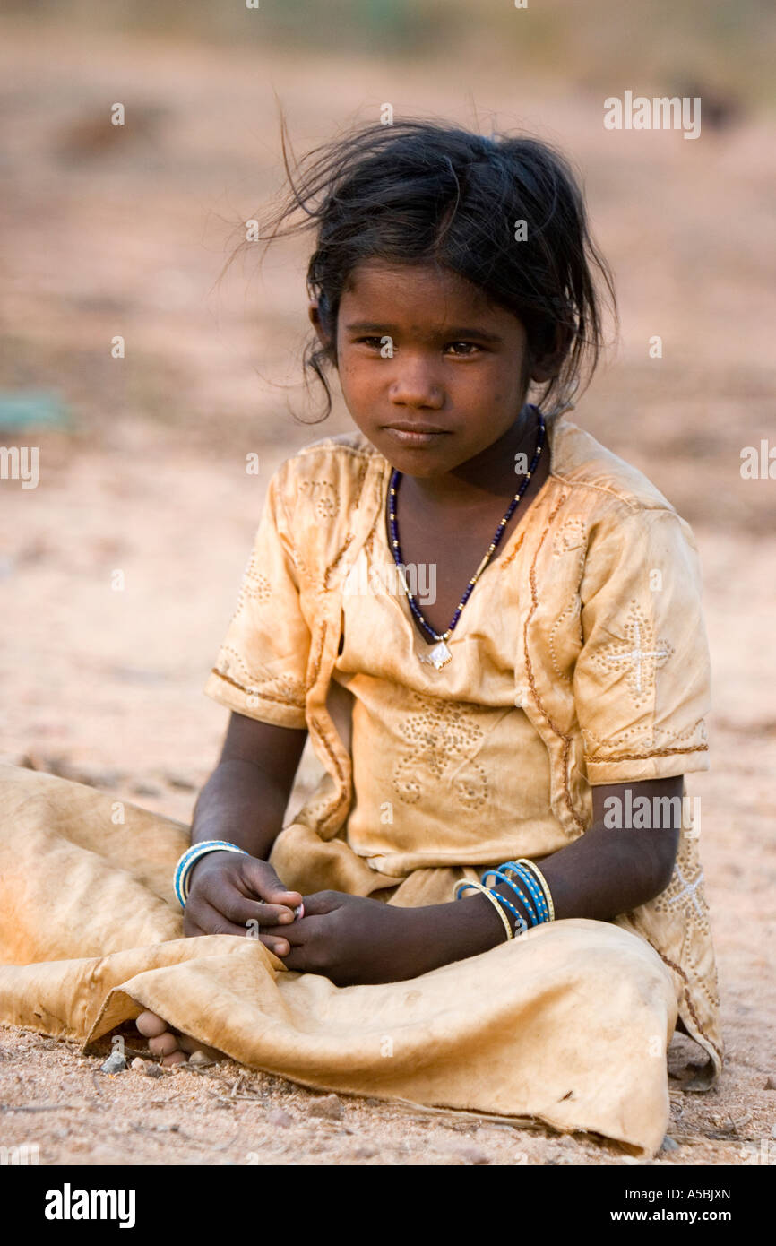 Sad girl sitting cross legged hi-res stock photography and images - Alamy