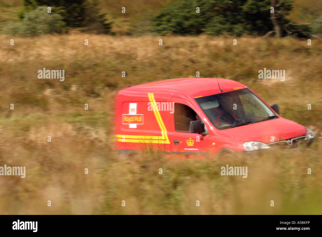 royal mail van driving through the countryside Stock Photo - Alamy