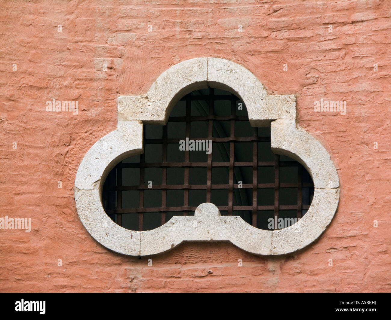 strange shape windows on a brick wall texture Stock Photo - Alamy