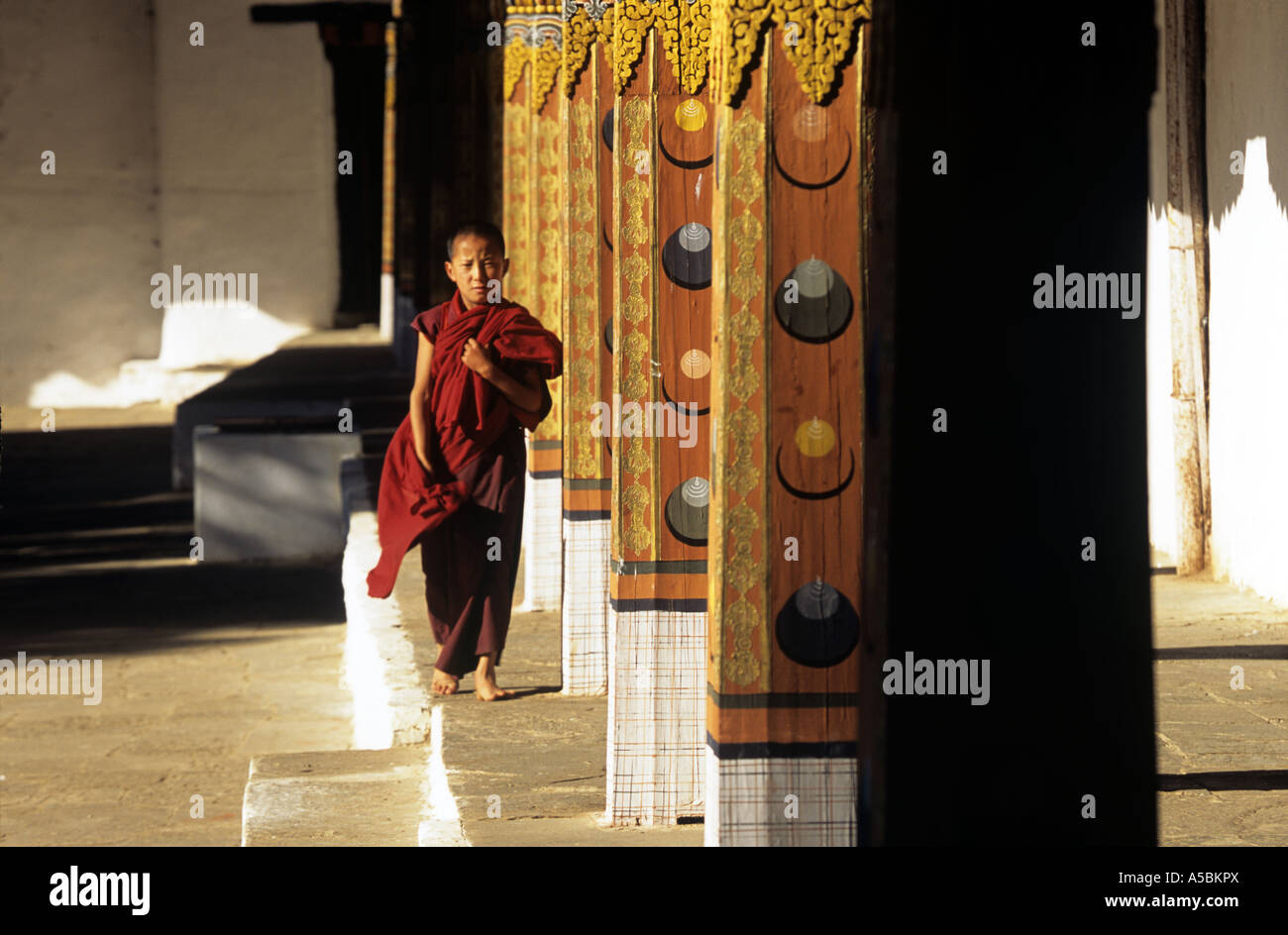 Novice monk inside Buddhist monastery, Bhutan Stock Photo - Alamy