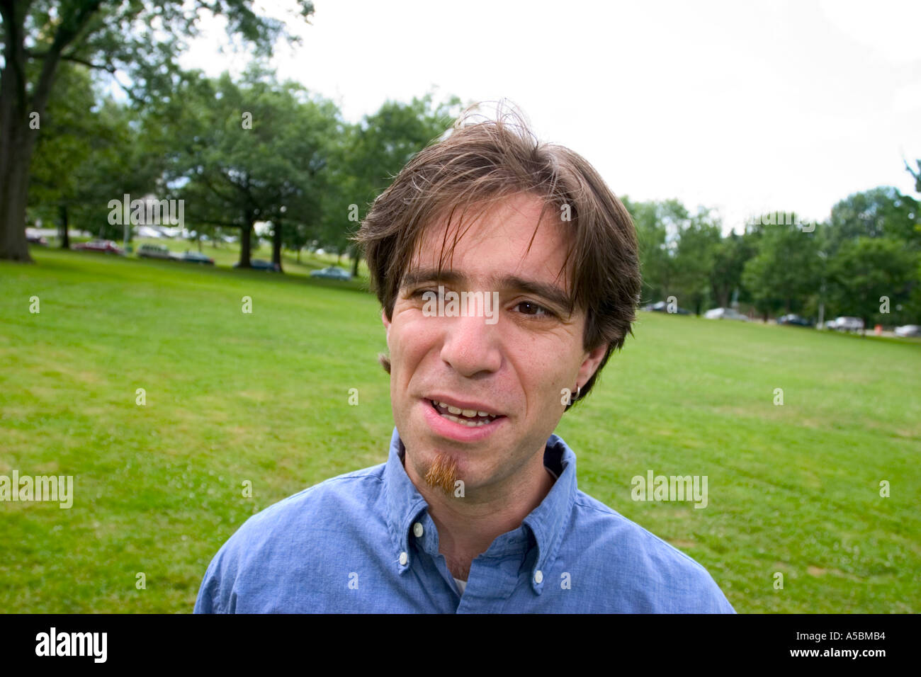 Young man making an odd face Stock Photo - Alamy