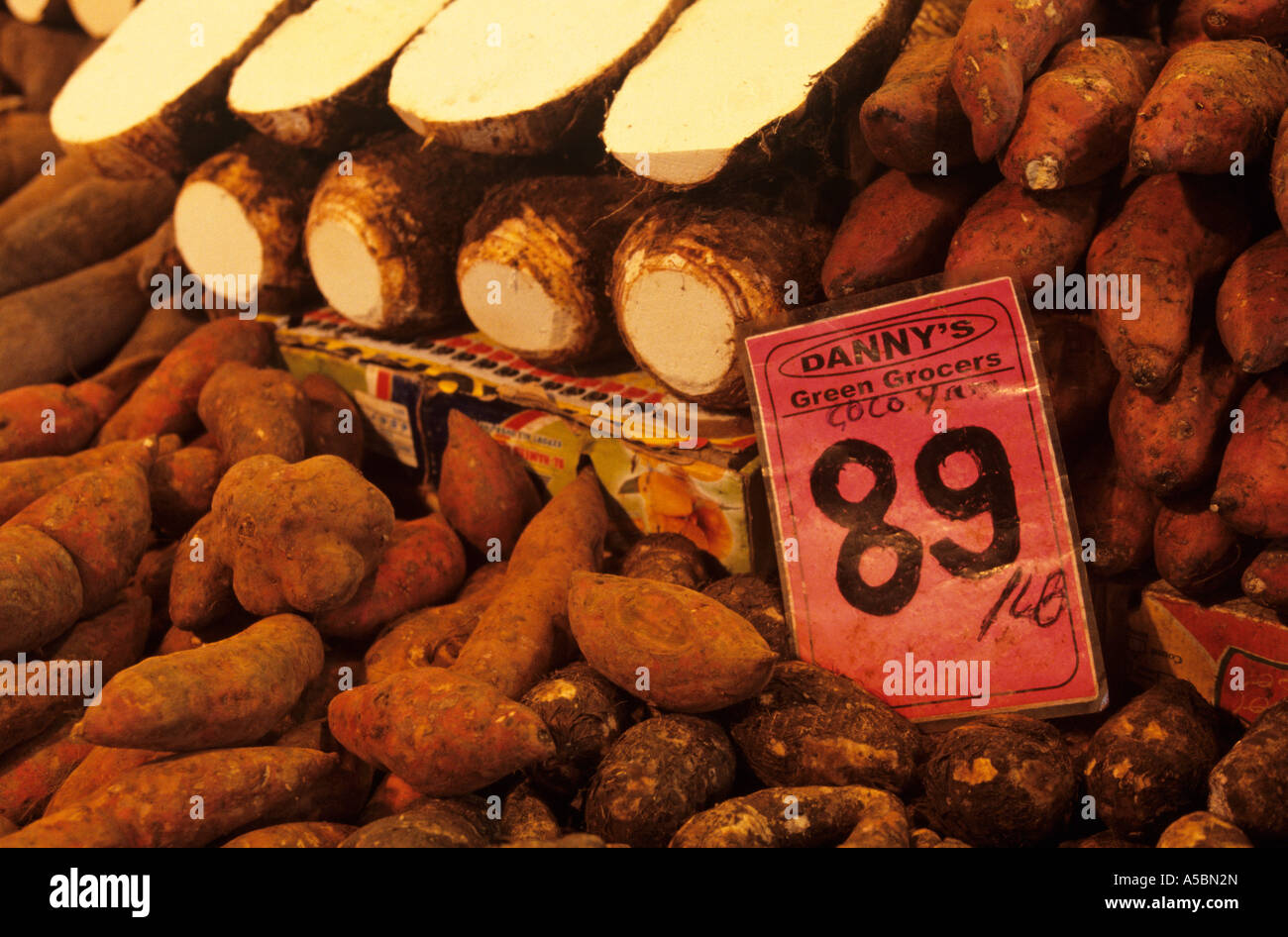 Sweet potatoes on display at Brixton market London Stock Photo - Alamy