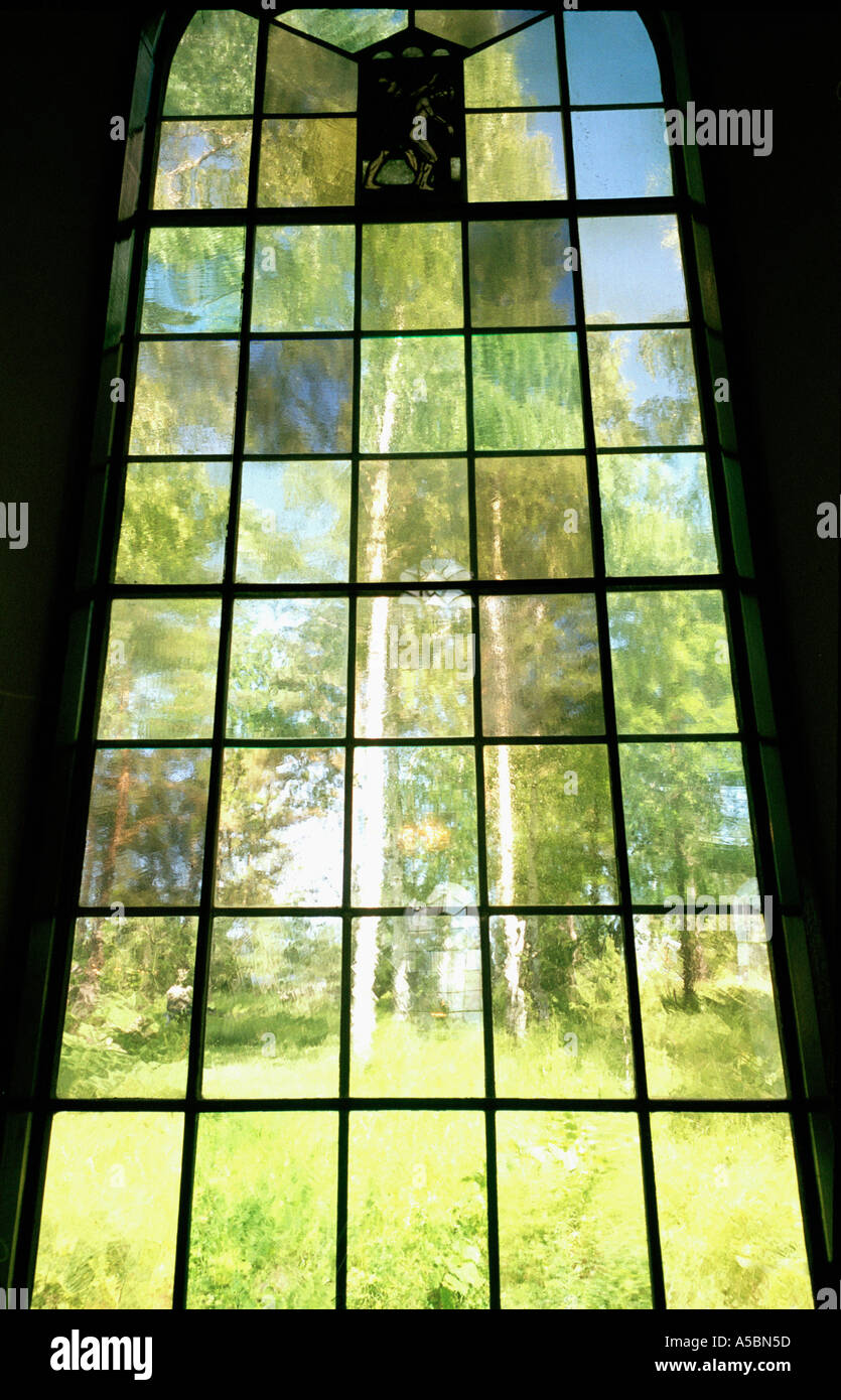 Multi colored window in a church Stock Photo - Alamy