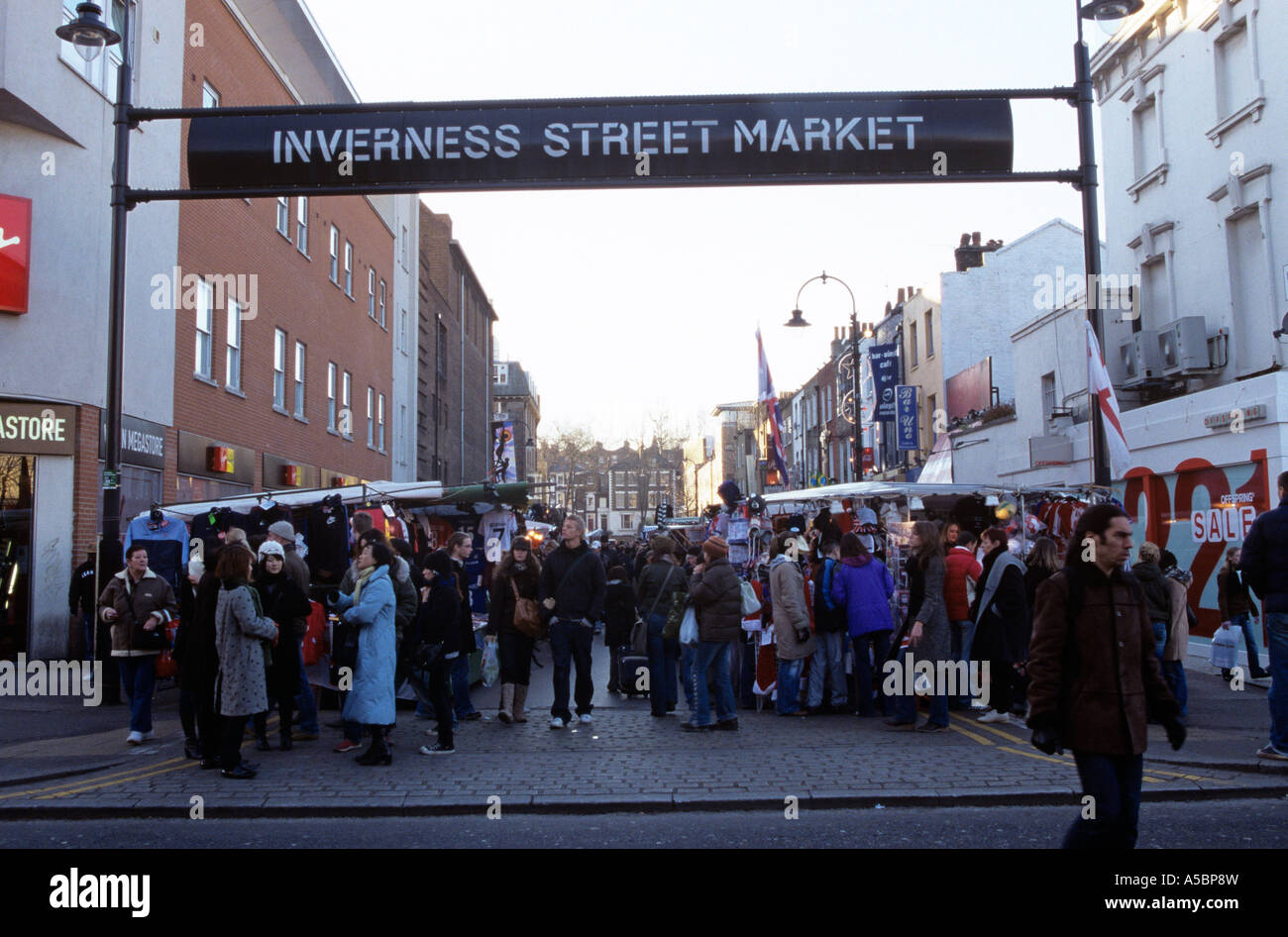 A huge sign at the entrance to Inverness street market in Camden London ...