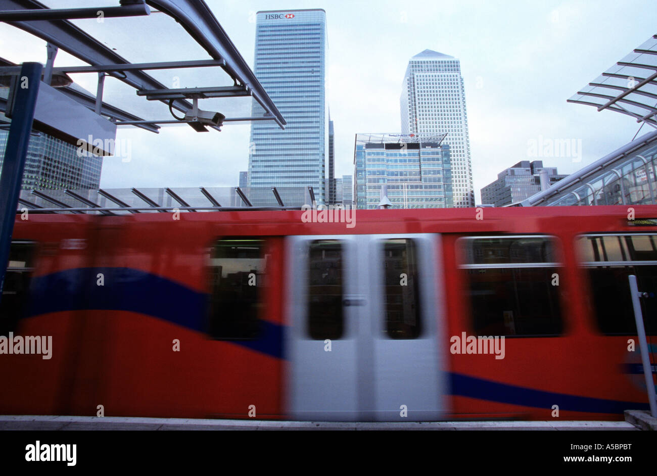 A view of a train with the HSBC building in the background at the ...