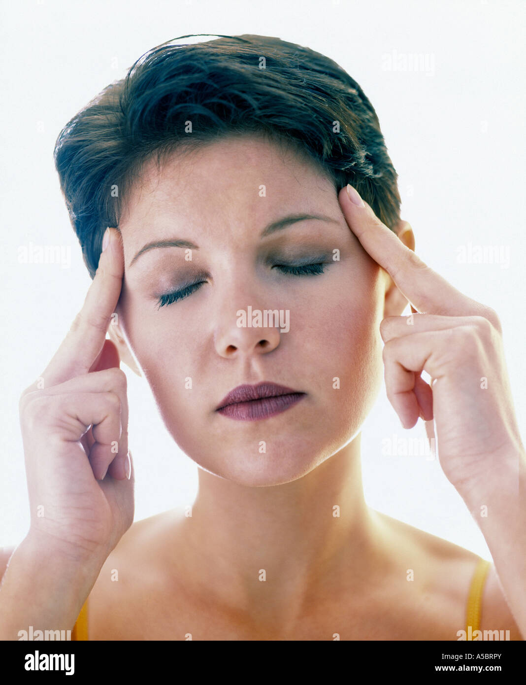 Woman Massaging Head Outdoors High Resolution Stock Photography and ...