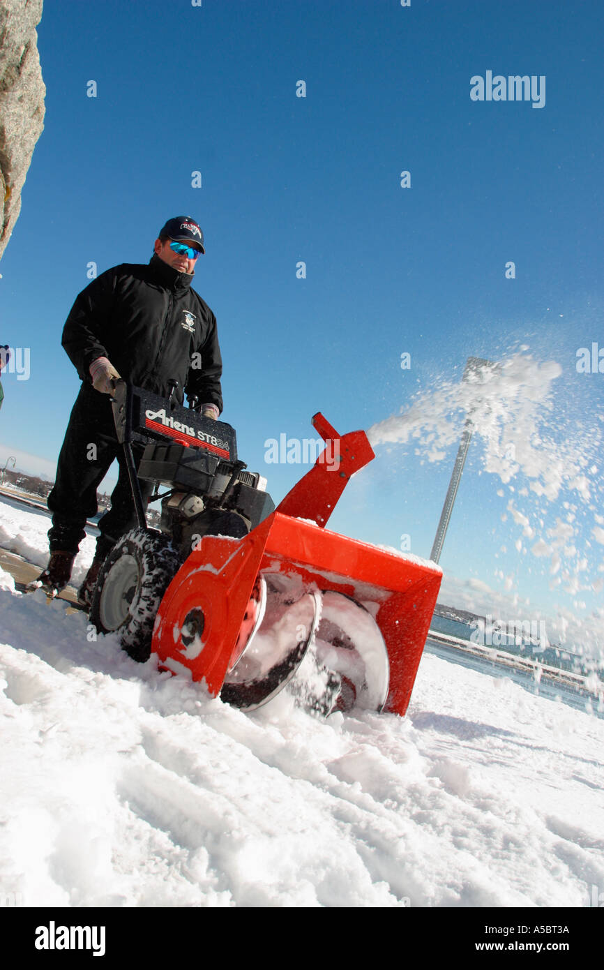 Man using snow blower hi-res stock photography and images - Alamy