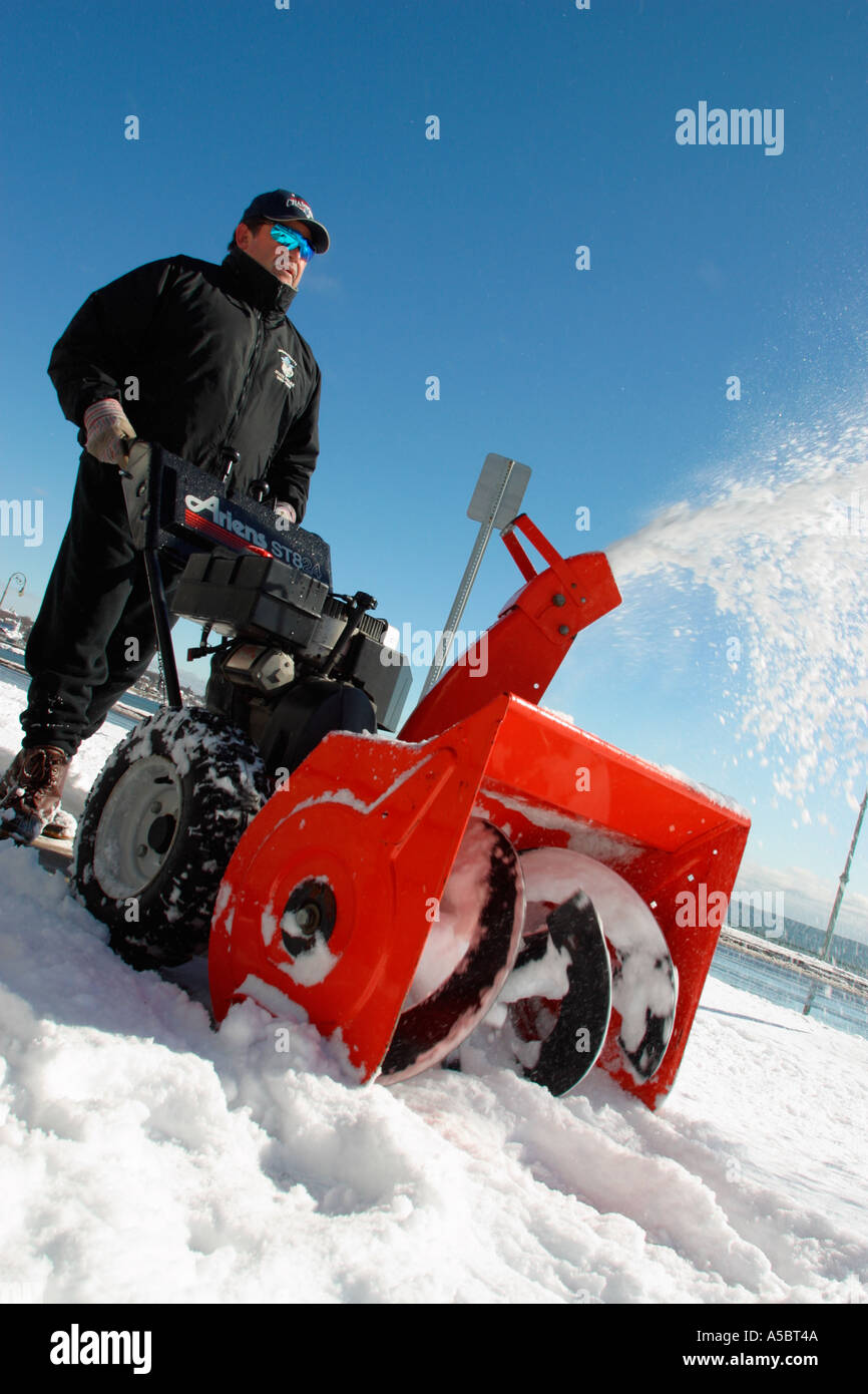 Worker using snow blower hi-res stock photography and images - Alamy