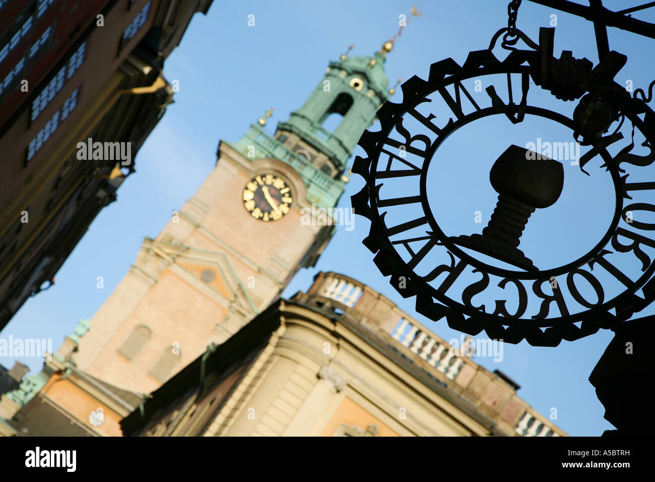 Sign and spire Stockholm Sweden Stock Photo - Alamy