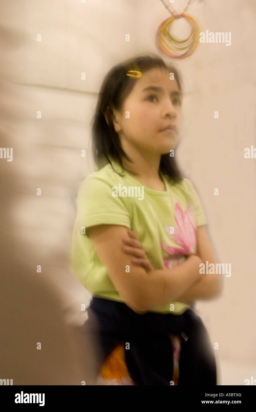 Asian American student age 6 waiting to perform in school musical ...