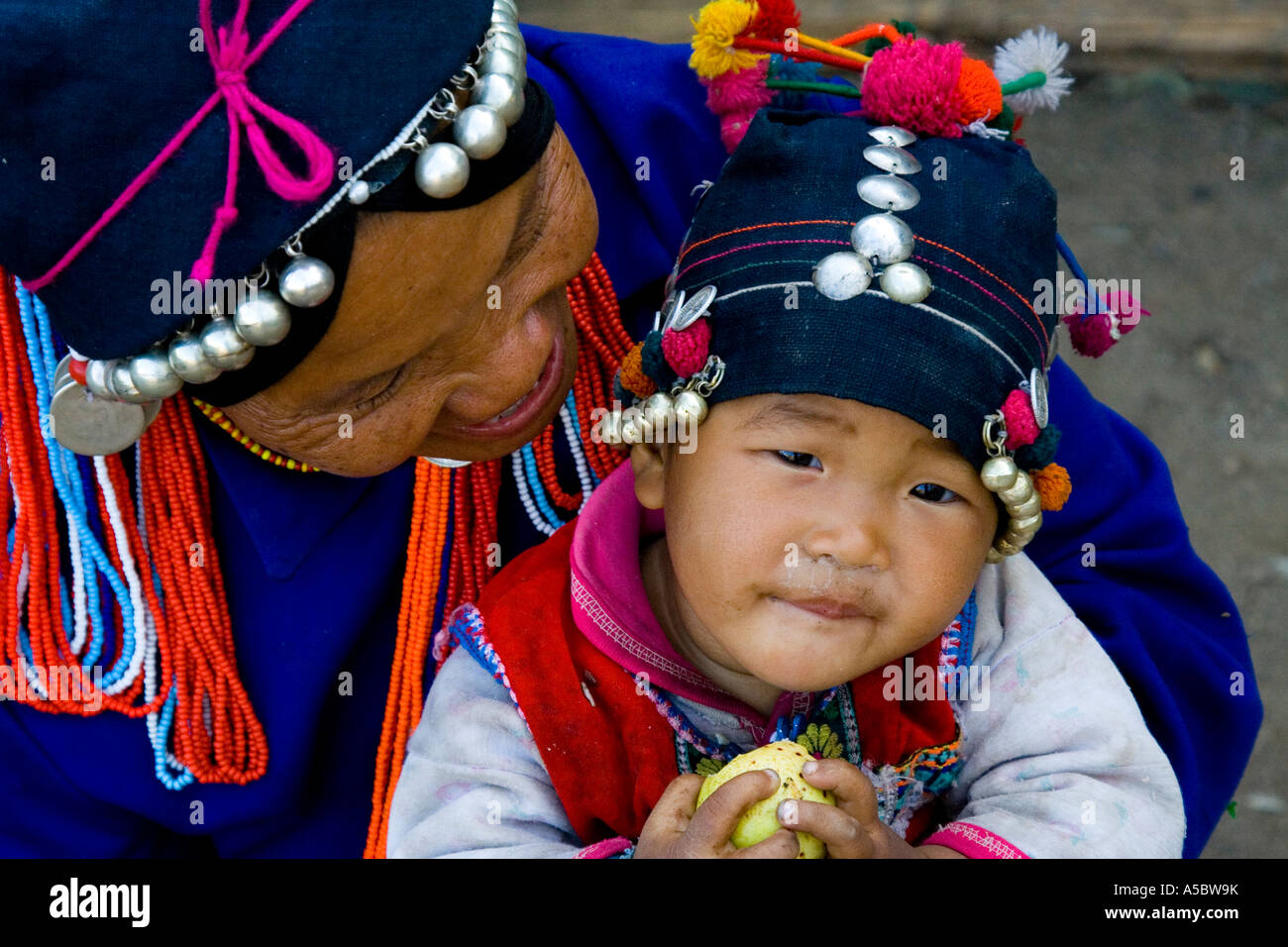 Akha hani woman baby china hi-res stock photography and images - Alamy