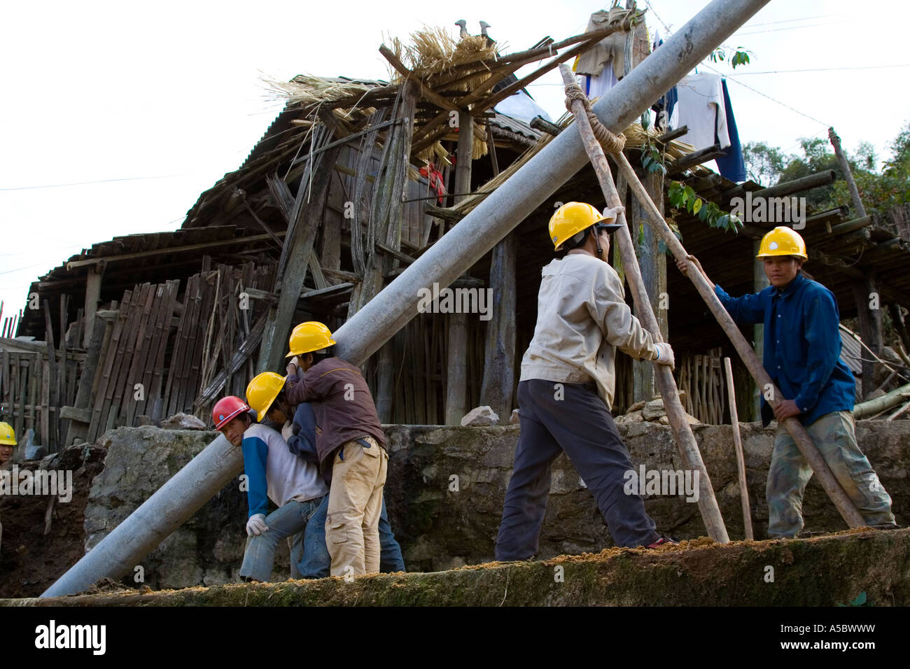 Installing Telephone Lines in a Small Town Near Xiding Xishuangbanna ...