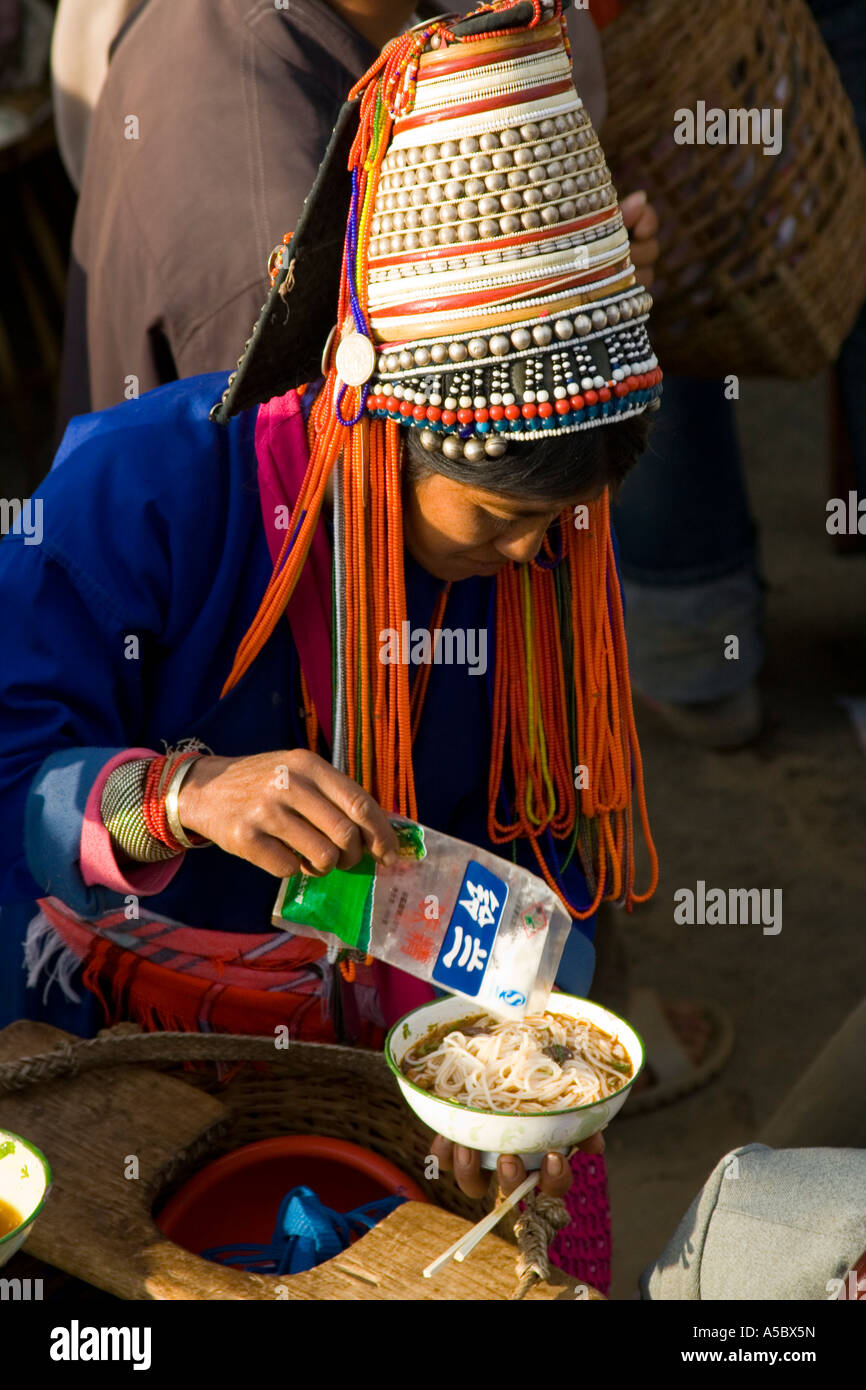 Akha Woman Adding MSG to Soup Xiding Market Xishuangbanna China Stock ...