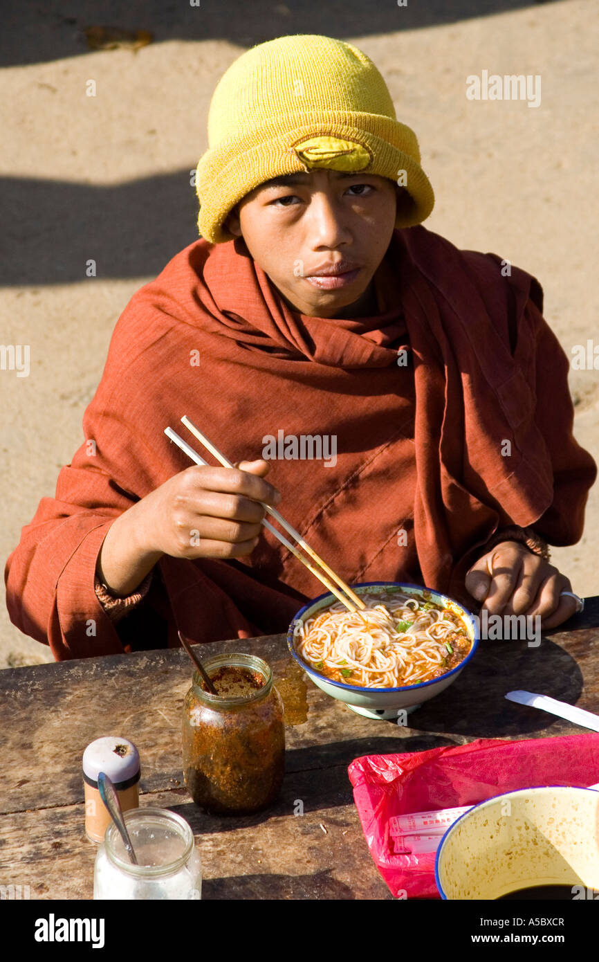 Novice monk eating hi-res stock photography and images - Alamy