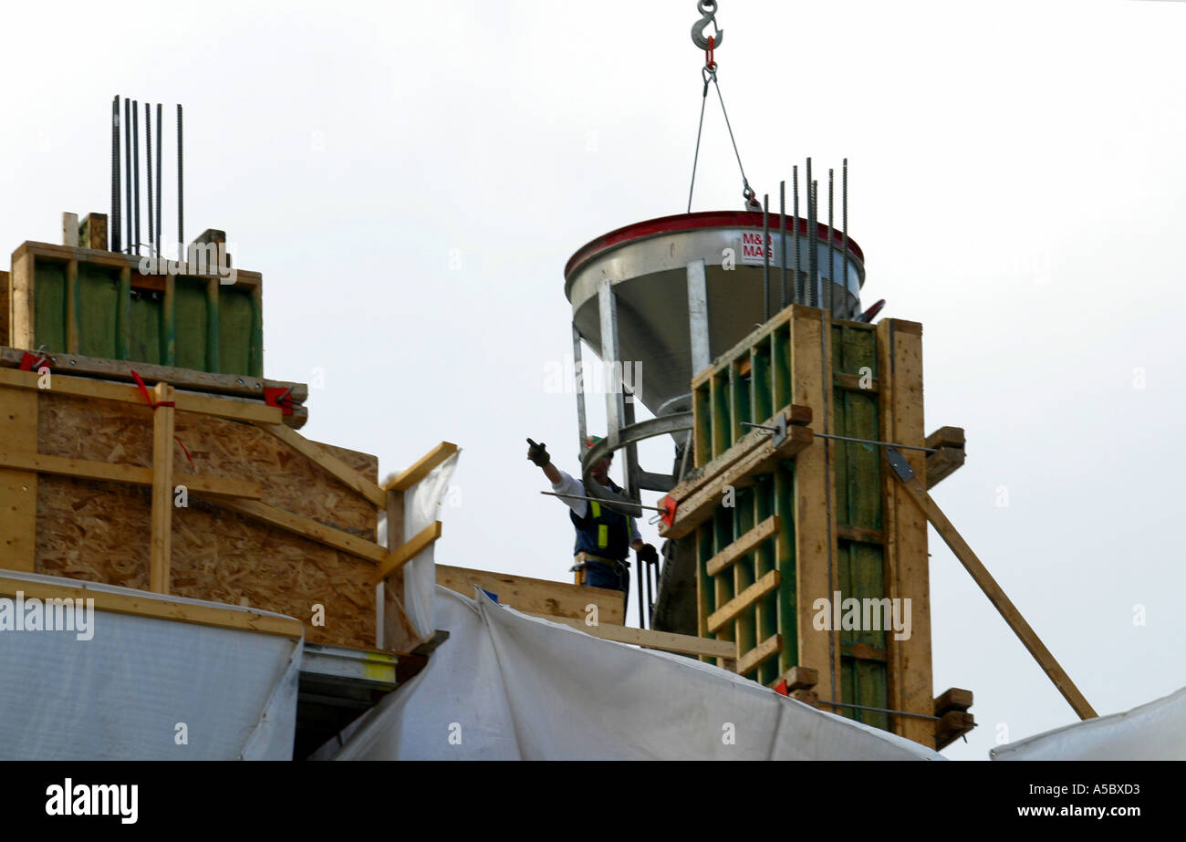 Crane lifting cement container construction hi-res stock photography ...