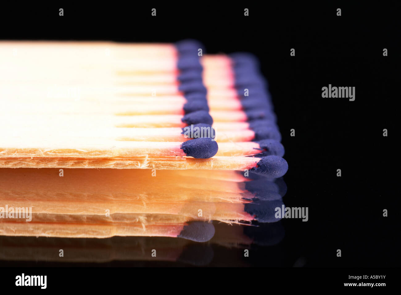 Matches, black background Stock Photo - Alamy