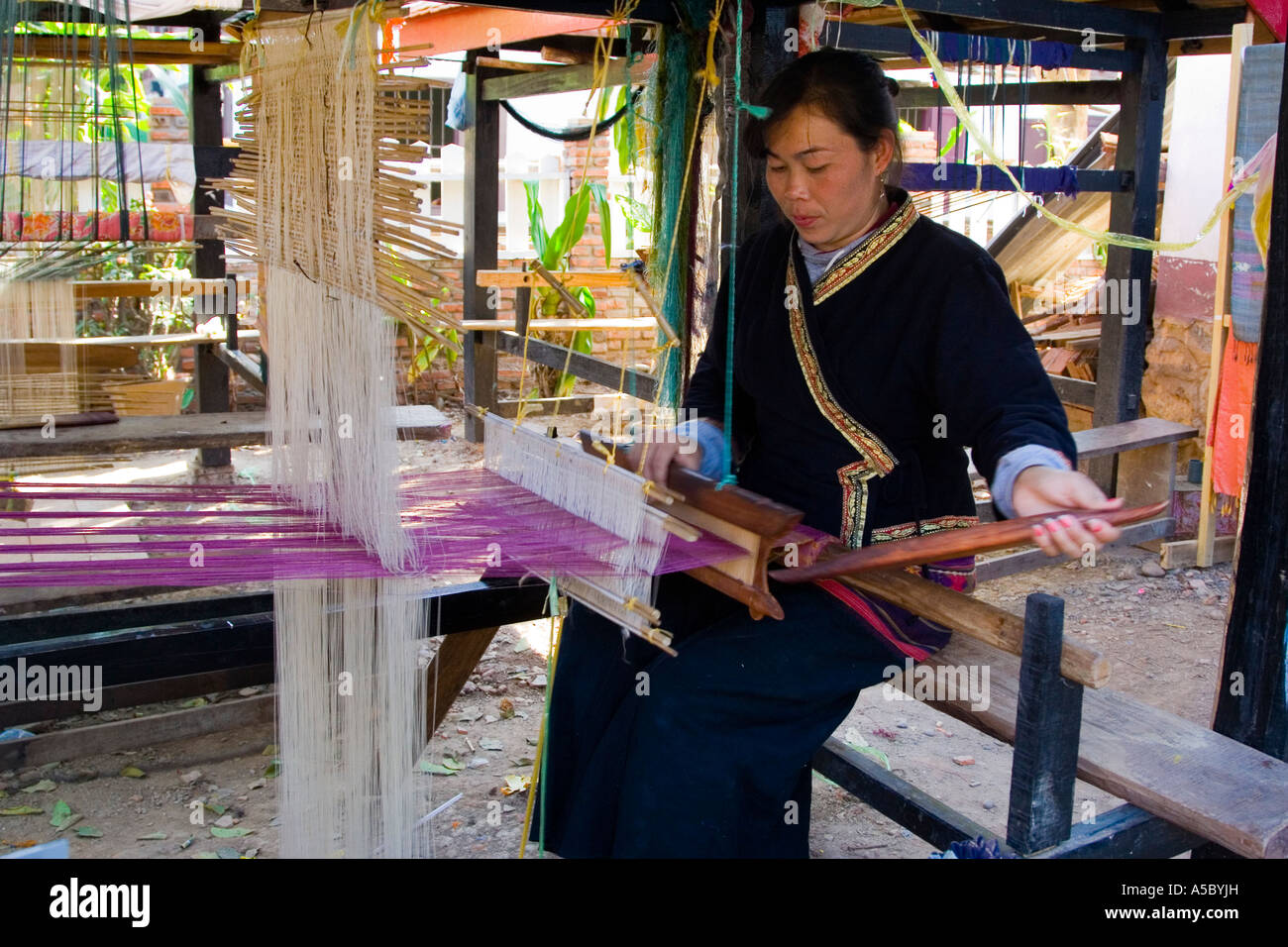 Woman at lao loom hi-res stock photography and images - Alamy