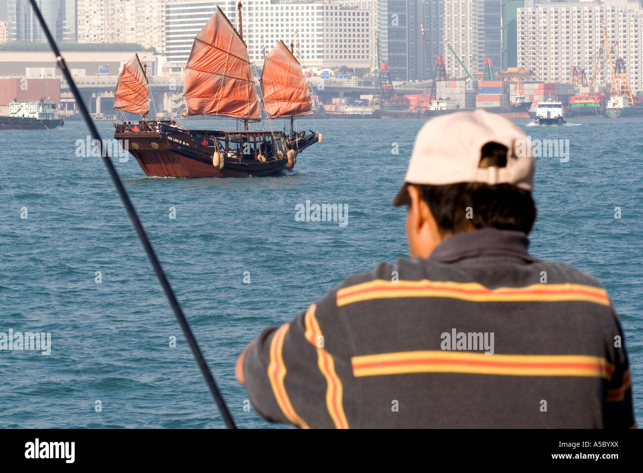 Duk Ling Fishing Junk and Chinese Man Fishing Hong Kong China Stock ...
