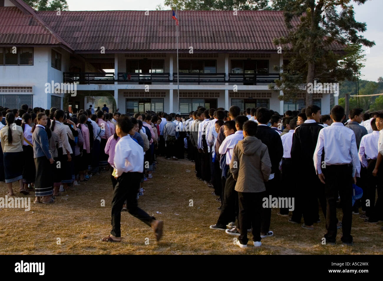 Late for Assembly Hongsa Laos Stock Photo - Alamy