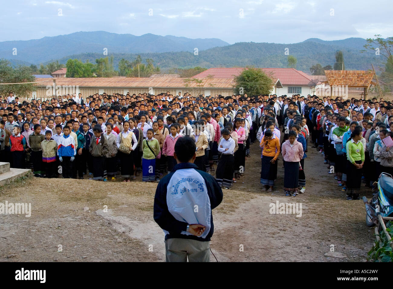 Speaker in front of Outdoor School Assembly Hongsa Laos Stock Photo - Alamy