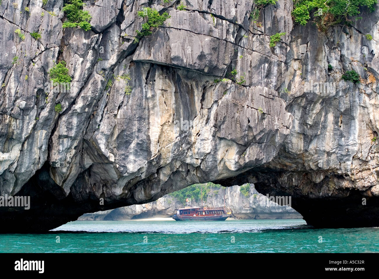Looking Through Limestone Arch Cave at Tourist Junk Halong Bay Vietnam ...