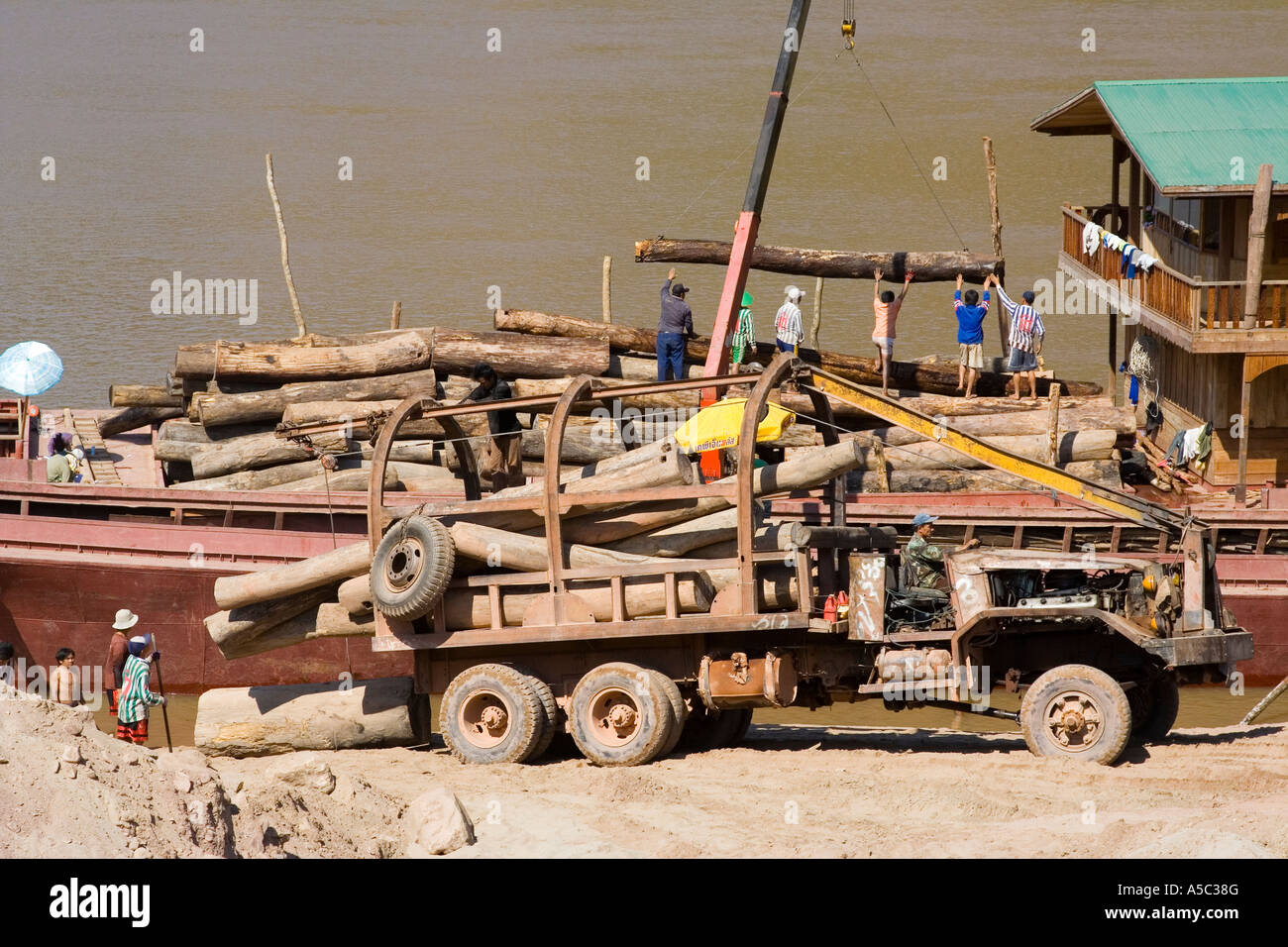 Unloading Logs from Truck and Loading Barge Tha Suang Laos Stock Photo ...