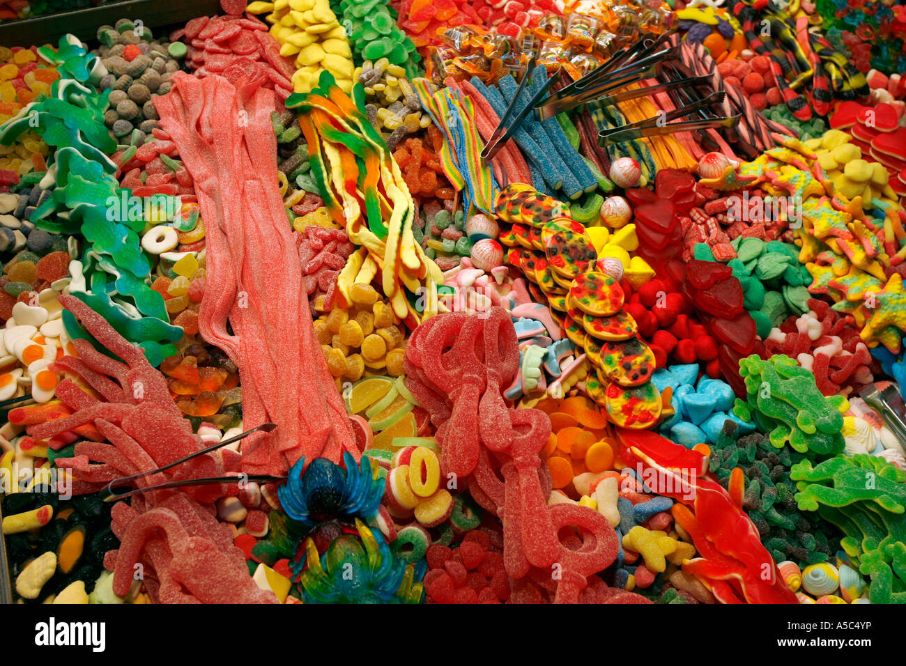 Sweets for sale on a market stall Stock Photo - Alamy