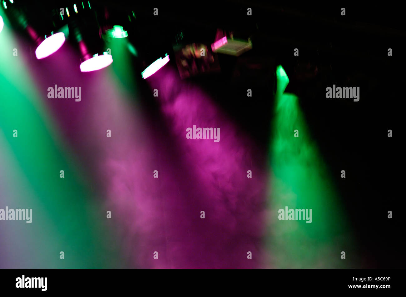Coloured stage lights and smoke as a vivid colour background Stock ...