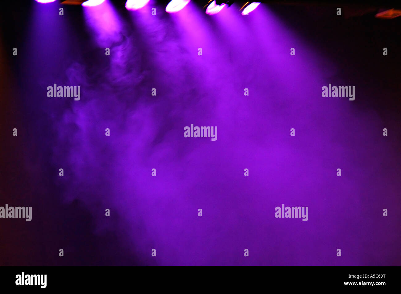 Coloured stage lights and smoke as a vivid colour background Stock ...