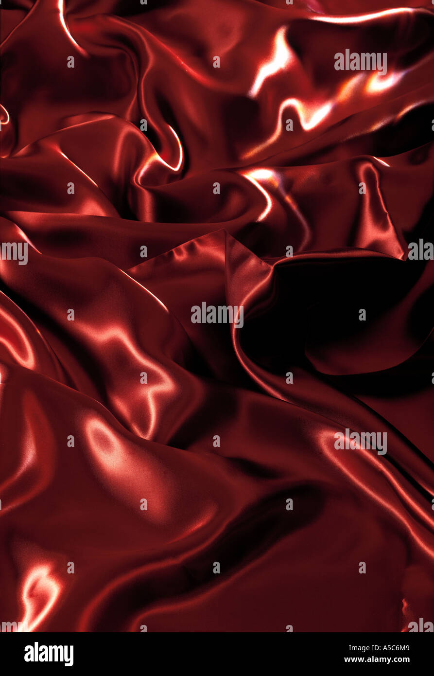 Red silk backgrounds hi-res stock photography and images - Alamy