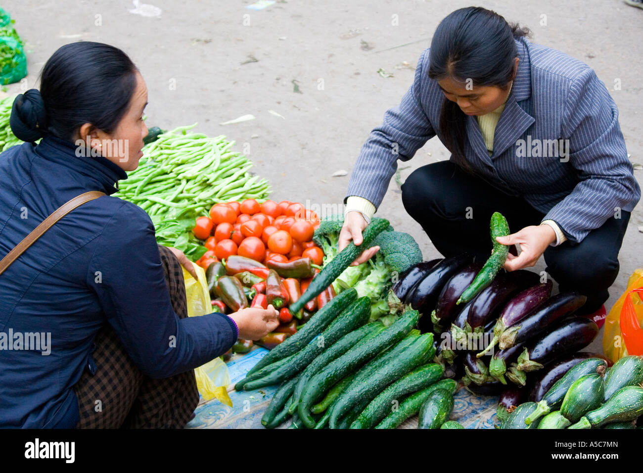 Woman Selling in the Market Mengla Xishuangbanna China Stock Photo - Alamy
