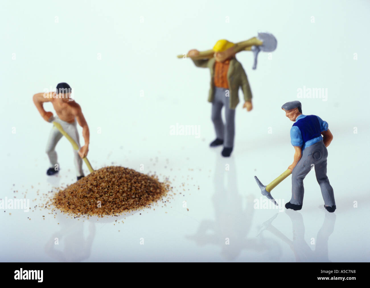 Figurines of construction workers Stock Photo - Alamy