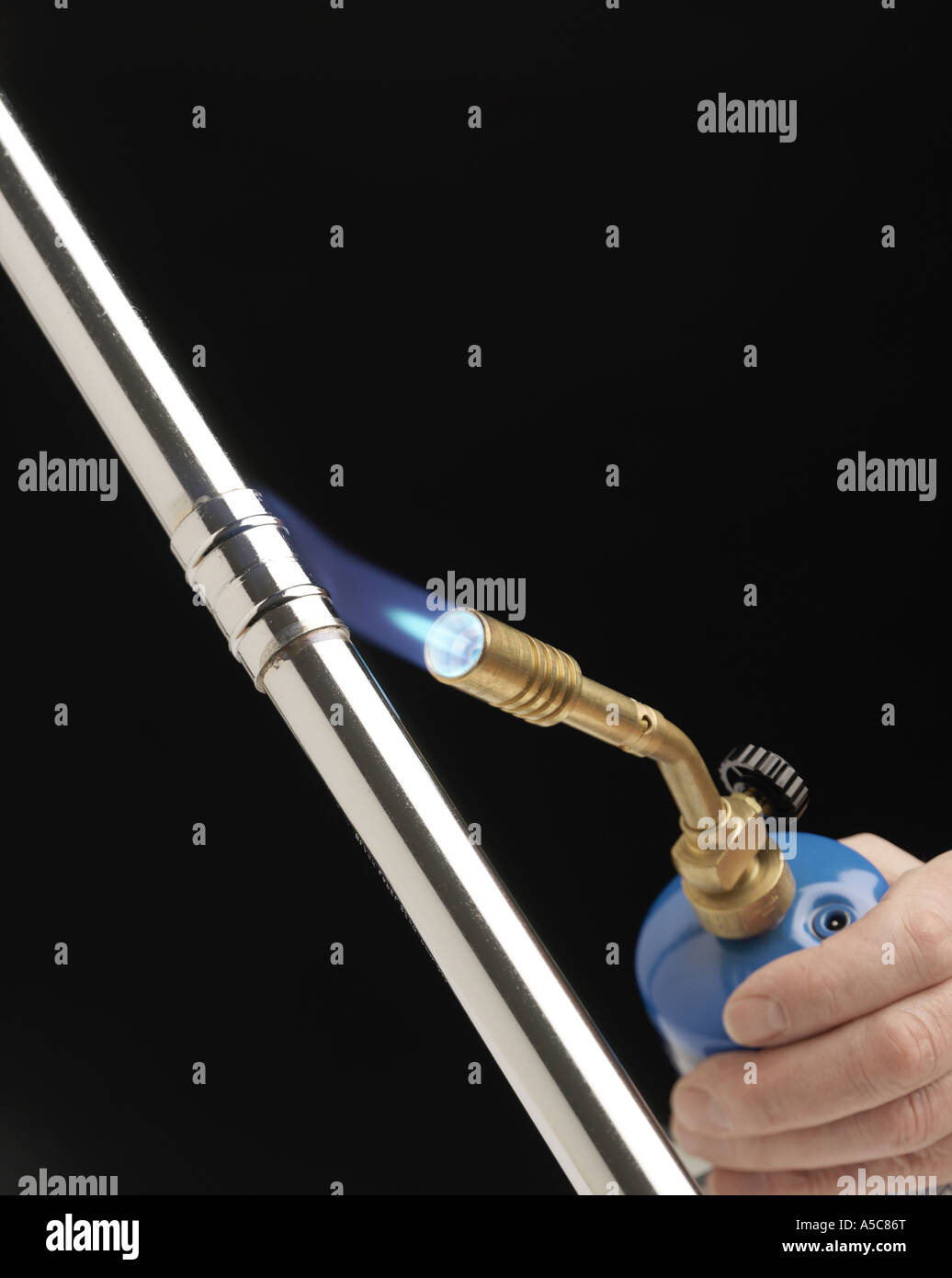 Gas Blow Torch heating up a Yorkshire Fitting on a 15mm chrome pipe ...