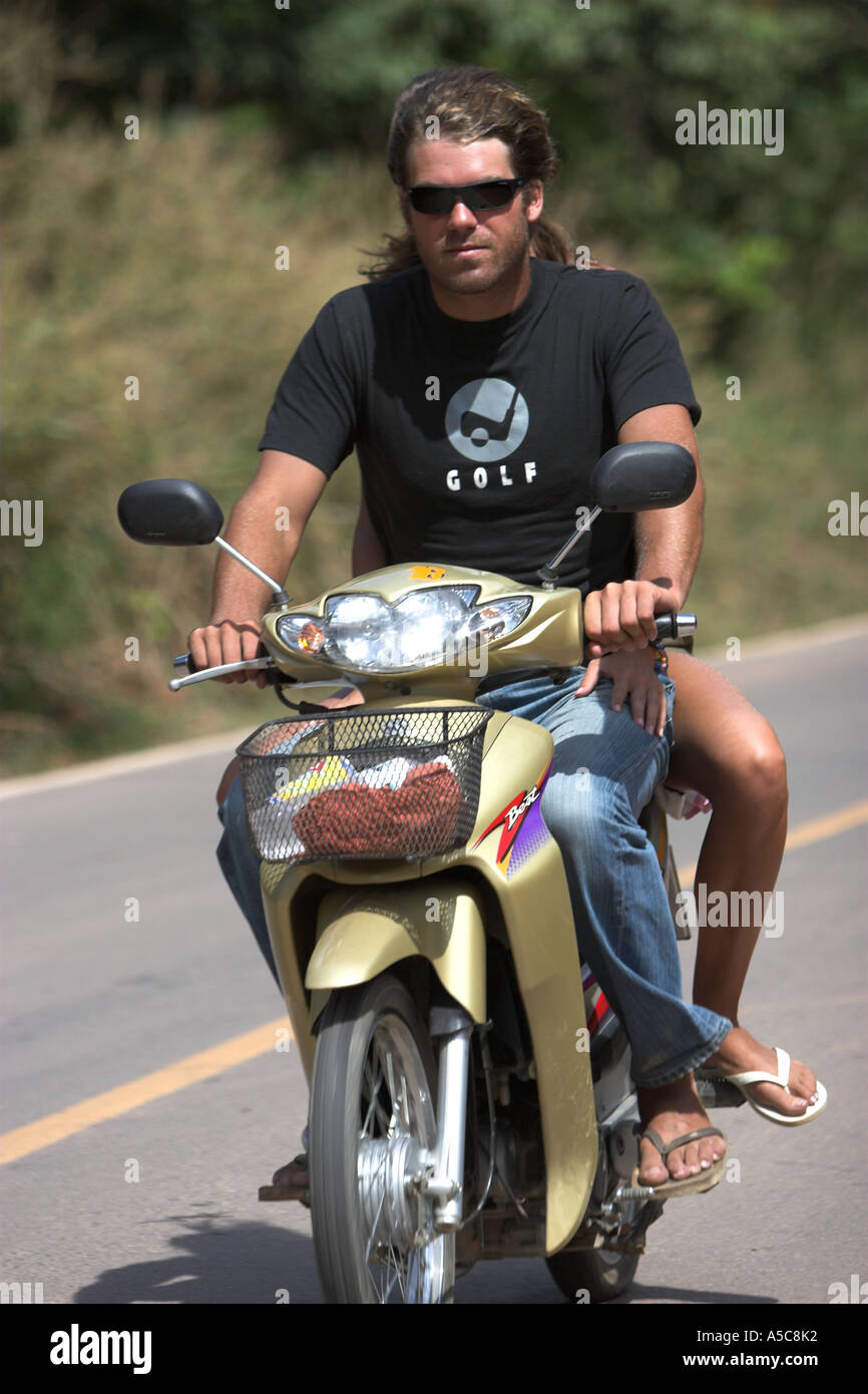 Motorbike rider without helmet hi-res stock photography and images - Alamy